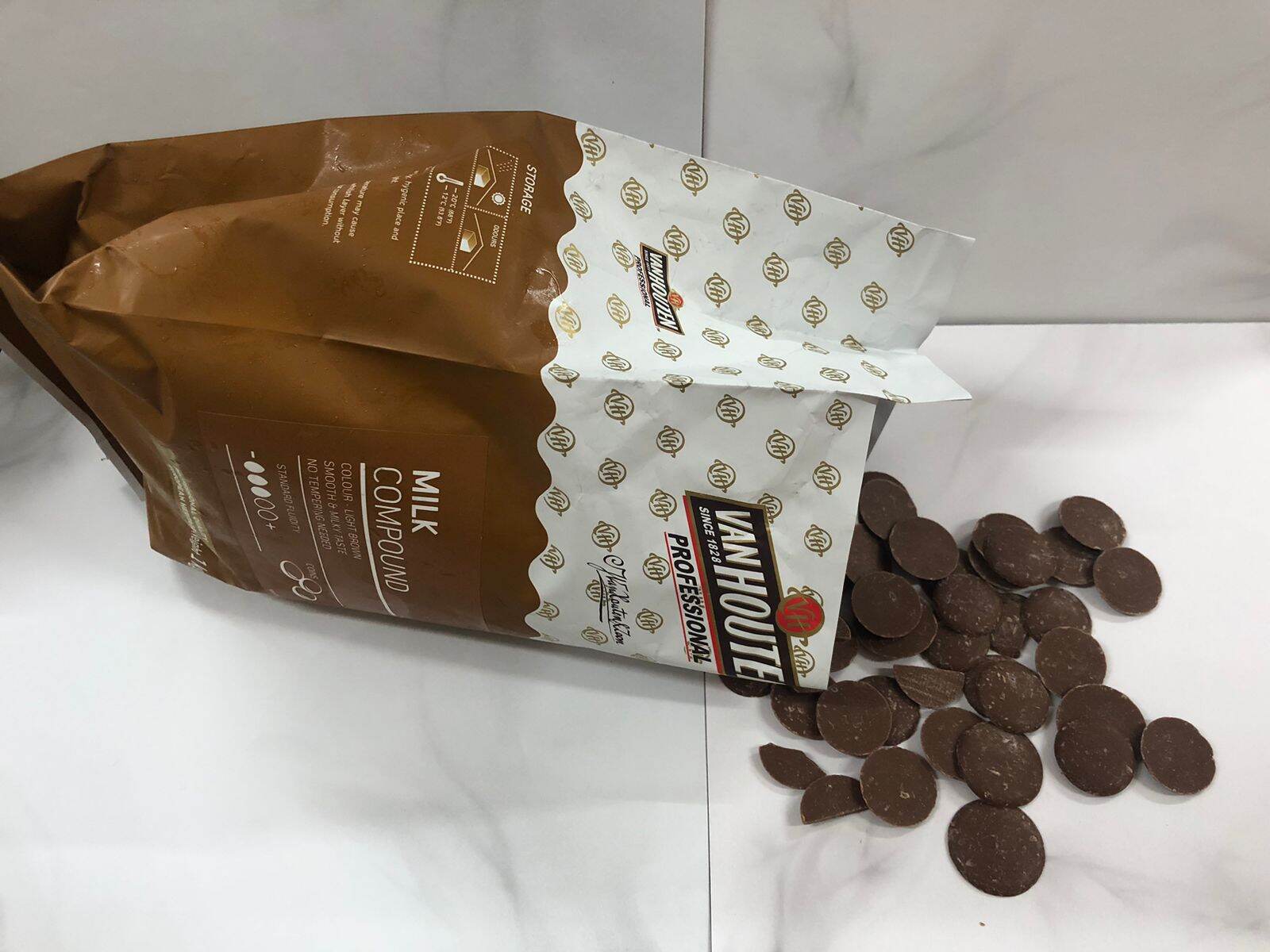BAHAN KUE VAN HOUTEN MILK COMPOUND CHIP 100 GR REPACK | Lazada Indonesia