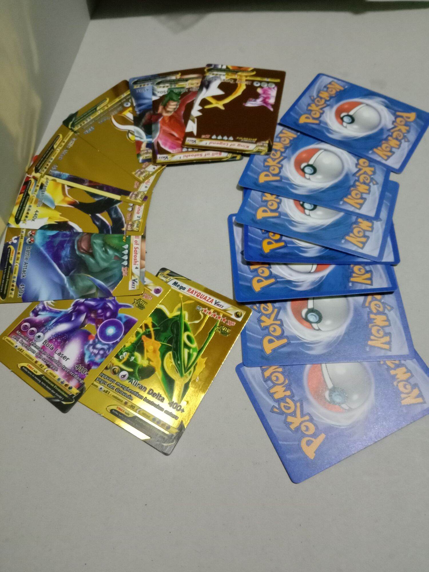 Mainan kartu pokemon emas isi 21 lembar terdiri dari 1Gol yg emas ...